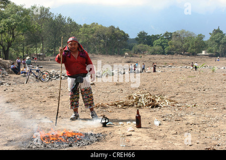 Mayan priests in ritual with Maya altar, burning candles and Stock ...