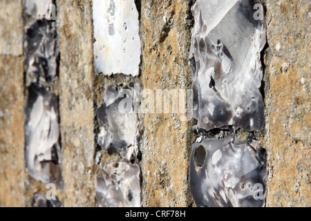 Traditional knapped flint stone wall in Norfolk, England Stock Photo ...