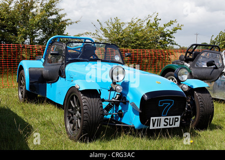 Vintage old caterham 7 sports car tin model cutout Stock Photo - Alamy