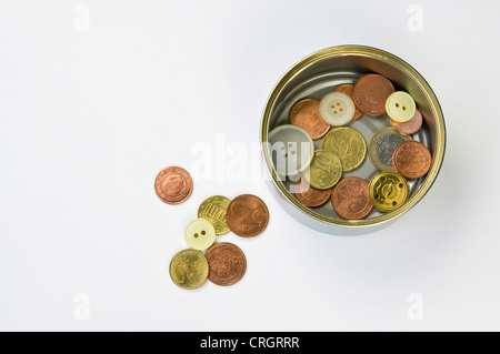 Savings cans and coins Stock Photo - Alamy
