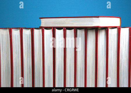 Close-up view of a row of Encyclopaedia Britannica volumes, red leather ...