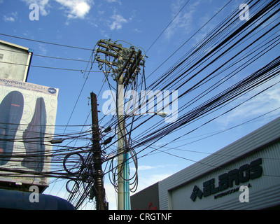 messy chaos wires cables , telephone and internet fiber signal line on ...