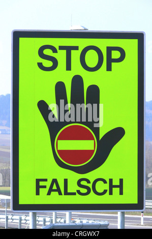 Hand writing sign Wrong Way, Concept meaning taking an unsuitable or ...