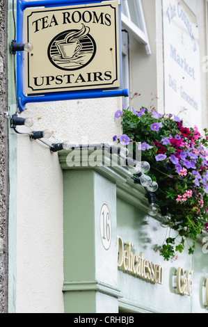 Sign at a cafe indicating that tea rooms are available upstairs Stock ...
