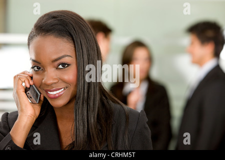 Darkskinned woman covering face with hands sitting on windowsill Stock ...
