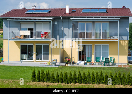 modern semi-detached house with flat roof dormer with aluminum cladding ...