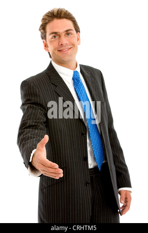 Businessperson extending their hand for a handshake in an office alone ...