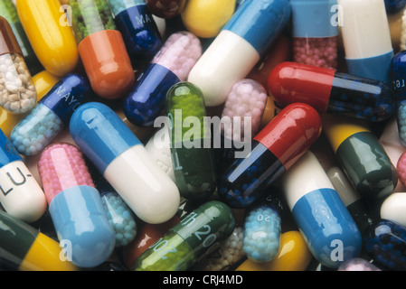 Drug capsules in different shapes and colors as Macro Stock Photo - Alamy