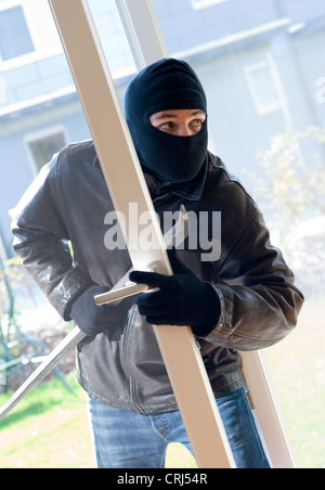 housebreaker breaking a backdoor Stock Photo - Alamy