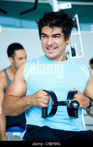 Man doing back training in the gym Stock Photo - Alamy