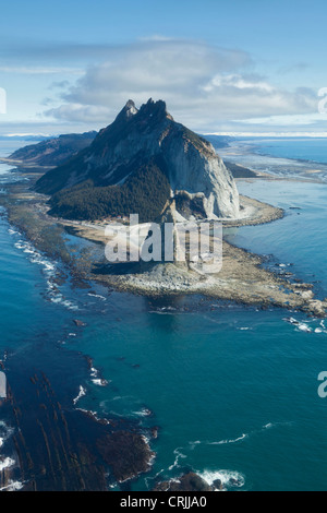 Gulf of Alaska, the lighthouse and rock pinnacle at Cape St. Elias on ...