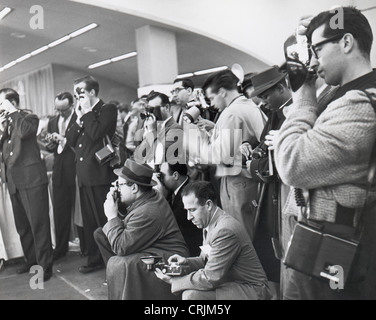 Photographers at a press conference Stock Photo - Alamy