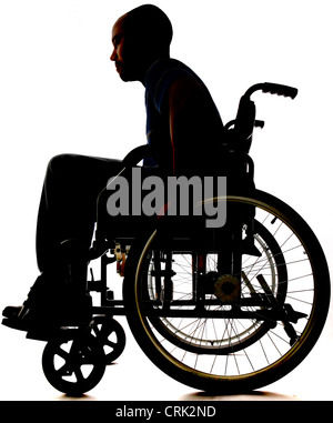 The young man in wheel-chair doing exercises indoors Stock Photo - Alamy