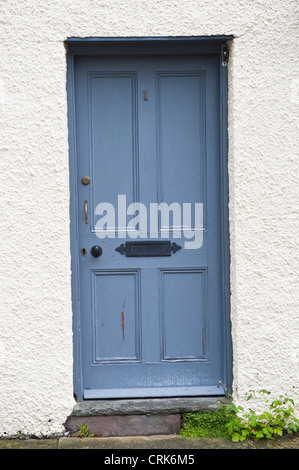 Scruffy gray and blue wooden paneled front doors no. 92 91 with handle ...