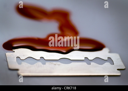 Razor blades and blood Stock Photo - Alamy