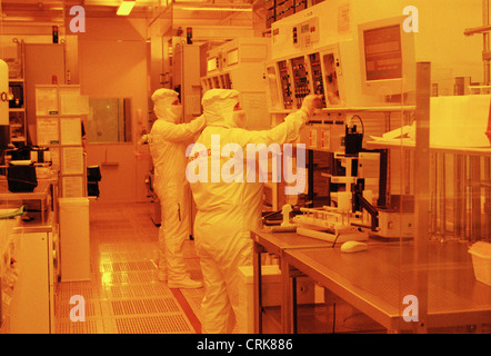 Employees in protective suit cleanroom at Infineon Stock Photo - Alamy