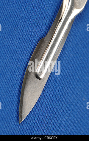 Surgical scalpel used to make the initial incision into a patient ...