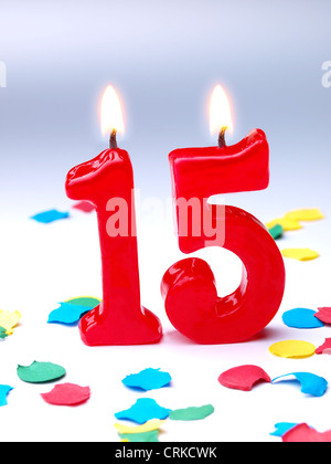 birthday cake with candles number fifteen isolated on white background ...