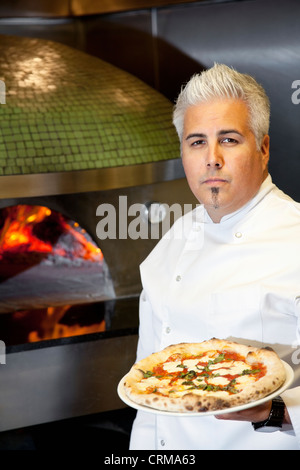 Pizza chef Stock Photo - Alamy