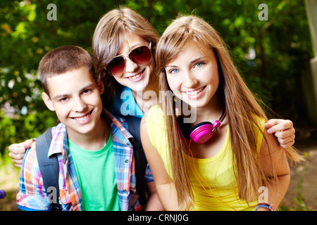 best friends are hugging in front of the camera Stock Photo - Alamy