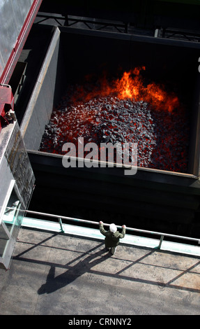 Burning coke in a coking plant Stock Photo - Alamy