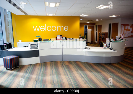 Welcome sign and desk at a modern reception area, London, England, UK ...