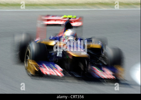 blurred Formula One race car during free practice for the Spanish ...