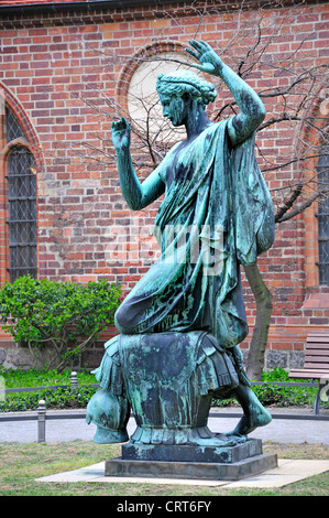 Bronze statue of Klio or Clio, the Muse of History, in front of the ...