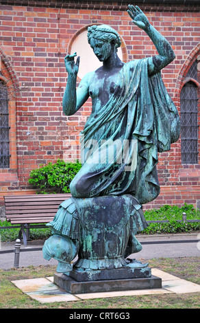 Bronze statue of Klio or Clio, the Muse of History, in front of the ...