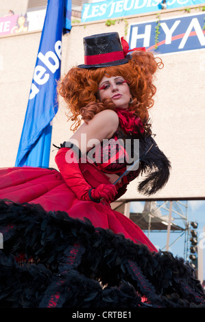 Female stilt artist photographed on Ste-Catherine street during the ...