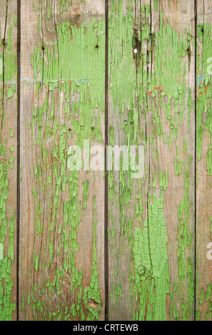 An aged, rust-painted wooden fence featuring a vintage Route 66 road ...