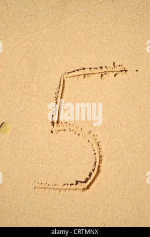 five written in the sand at the beach Stock Photo - Alamy