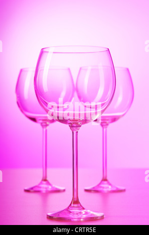 Wine glasses against gradient background Stock Photo - Alamy