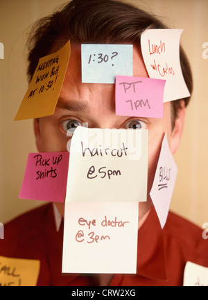 Man with reminders Stock Photo - Alamy