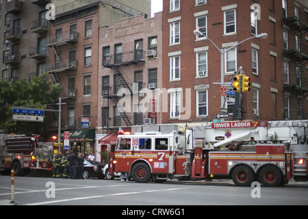 NYFD New York fire department medic ambulance with flashing lights on ...
