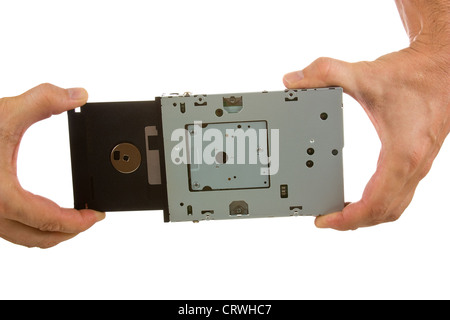 floppy disk drive in hand isolated on white background Stock Photo - Alamy