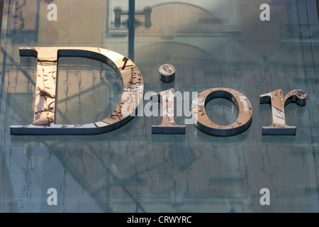 Dior brand fashion logo on retail shop exterior in New Bond Street ...