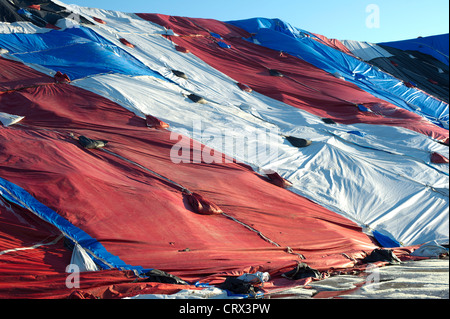 Tarp covers piles of salt, used to prevent freezing on roads during ...