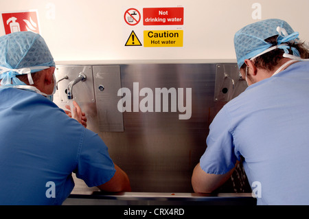 A surgeon scrubbing up before an operation Stock Photo: 49197486 - Alamy
