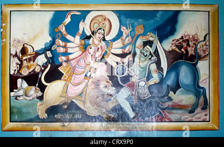 Durga slaying demon Stock Photo - Alamy