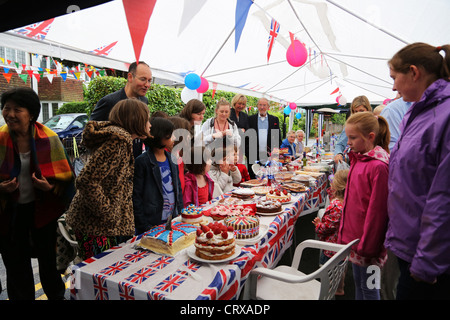 People Looking At Cakes During Cake Competition At Street Party During ...