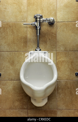 Public urinal over tiled wall,White porcelain urinals Stock Photo - Alamy