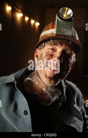 Mine worker with helmet and full body coal dust Stock Photo - Alamy