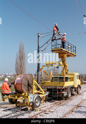 Installation work on the catenary a new tram line Stock Photo - Alamy