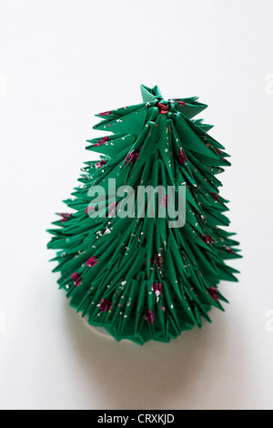 Origami Christmas trees of green craft paper isolated on white ...