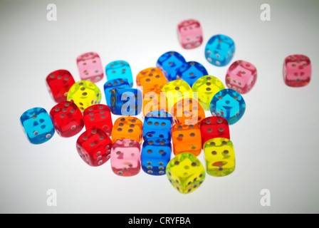 many different colored dice Stock Photo - Alamy