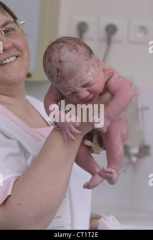 New born baby with vernix caseosa Stock Photo - Alamy