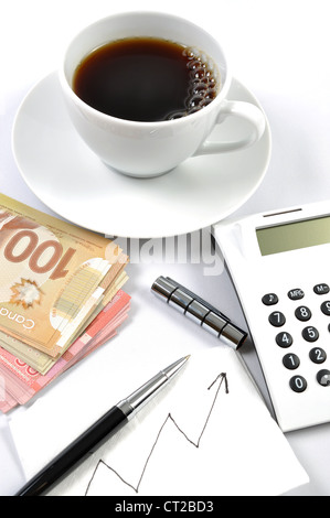 Chart with money, calculator and cup of coffee on wooden background ...