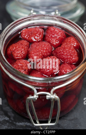 Raspberries in Glass Storage Jar Stock Photo - Alamy