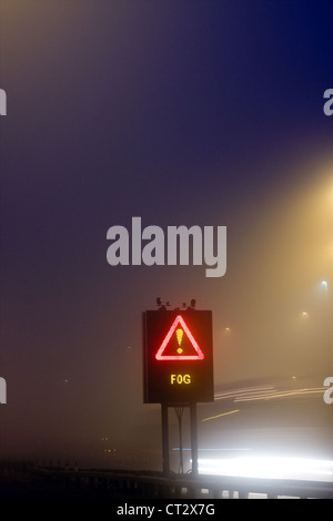 Fog sign on raod Stock Photo - Alamy